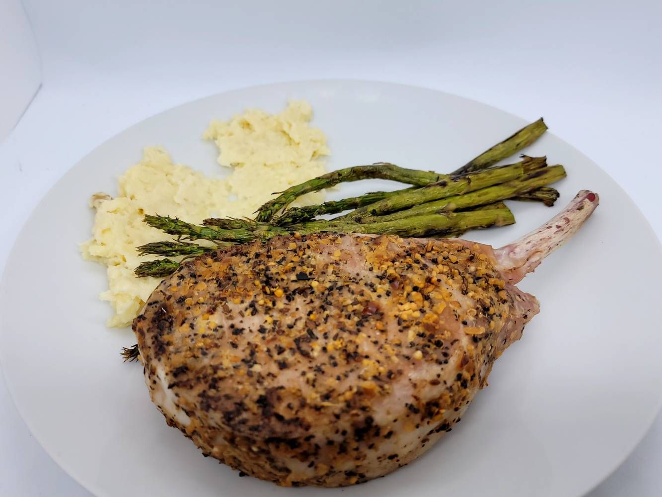 Tomahawk de porc nagano avec asperges grillé et pu... - Samsung Members